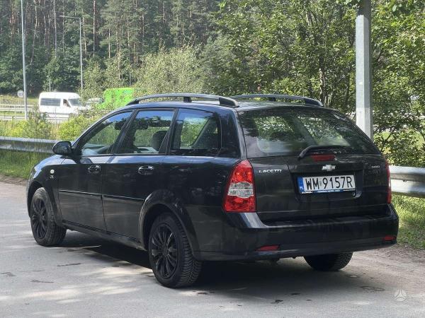 Black Chevrolet Lacetti 2008 in Vilnius, with an engine capacity of 1.60 L and mileage of 250 thousand km for 950 €, photo 3 on AUTOMOTO.COM.LV