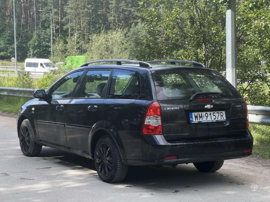 Black Chevrolet Lacetti 2008 in Vilnius, with an engine capacity of 1.60 L and mileage of 250 thousand km for 950 €, photo 4 on AUTOMOTO.COM.LV