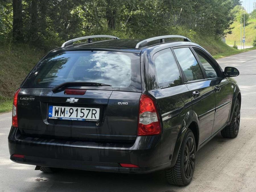 Black Chevrolet Lacetti 2008 in Vilnius, with an engine capacity of 1.60 L and mileage of 250 thousand km for 950 €, photo 5 on AUTOMOTO.COM.LV