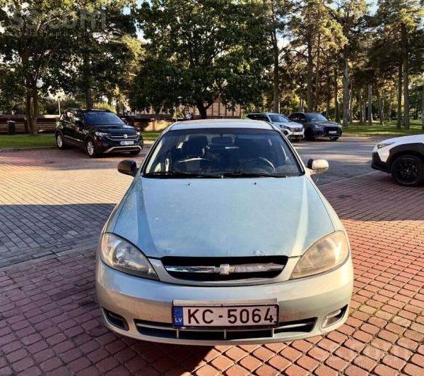 Chevrolet Lacetti 2006 in Ventspils on AUTOMOTO.COM.LV Blue Chevrolet Lacetti 2006 in Ventspils, with an engine capacity of 1.40 L and mileage of 248 thousand km for 900 €, photo 5 on AUTOMOTO.COM.LV