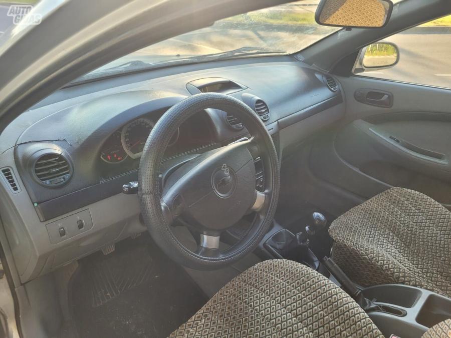 Grey Chevrolet Lacetti 2007 in Vilnius, with an engine capacity of 1.60 L and mileage of 150 thousand km for 550 €, photo 9 on AUTOMOTO.COM.LV