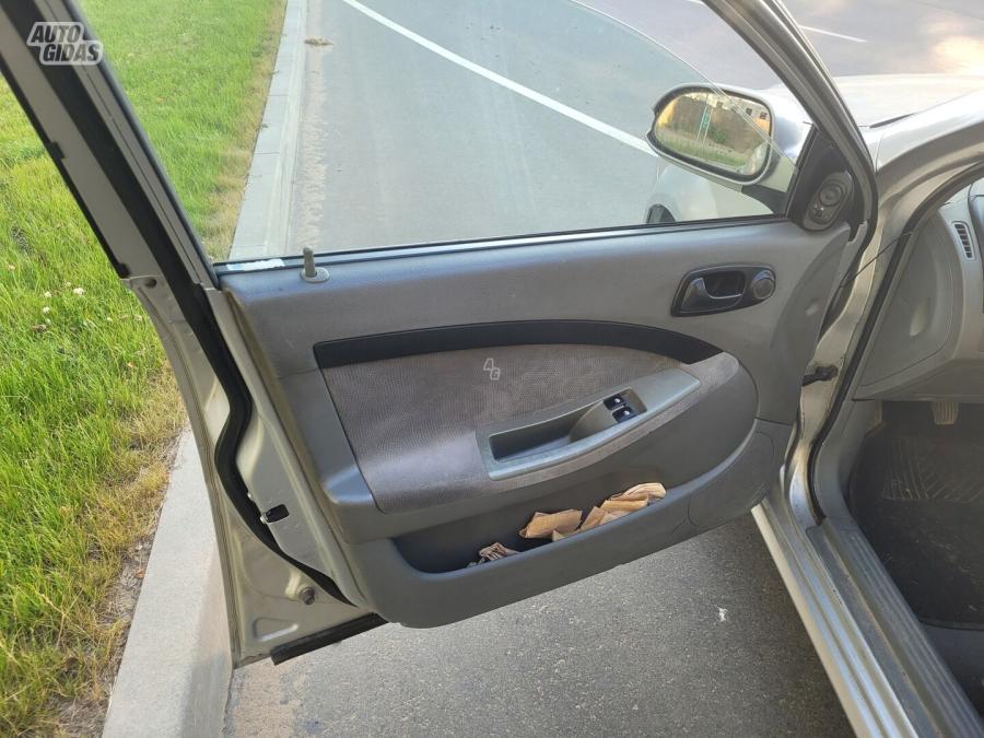 Grey Chevrolet Lacetti 2007 in Vilnius, with an engine capacity of 1.60 L and mileage of 150 thousand km for 550 €, photo 12 on AUTOMOTO.COM.LV