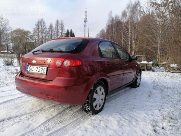 Sarkans Chevrolet Lacetti 2006 Rīga, ar dzinēja tilpumu 1.60 L un nobraukumu 215 tūkst. km par 900 €, foto 2 vietnē AUTOMOTO.COM.LV