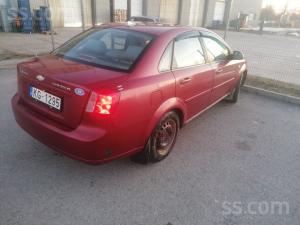 Red Chevrolet Lacetti 2007 in Cesis, with an engine capacity of 1.40 L and mileage of 285 thousand km for 1900 €, photo 2 on AUTOMOTO.COM.LV