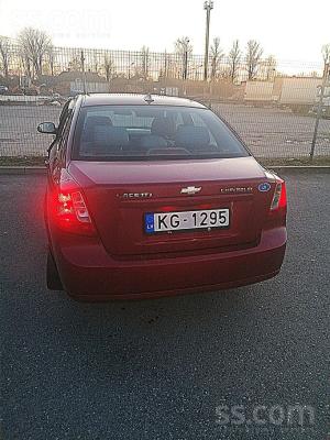 Red Chevrolet Lacetti 2007 in Cesis, with an engine capacity of 1.40 L and mileage of 285 thousand km for 1900 €, photo 3 on AUTOMOTO.COM.LV