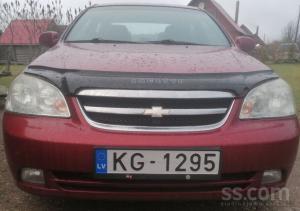 Red Chevrolet Lacetti 2007 in Cesis, with an engine capacity of 1.40 L and mileage of 285 thousand km for 1900 €, photo 4 on AUTOMOTO.COM.LV