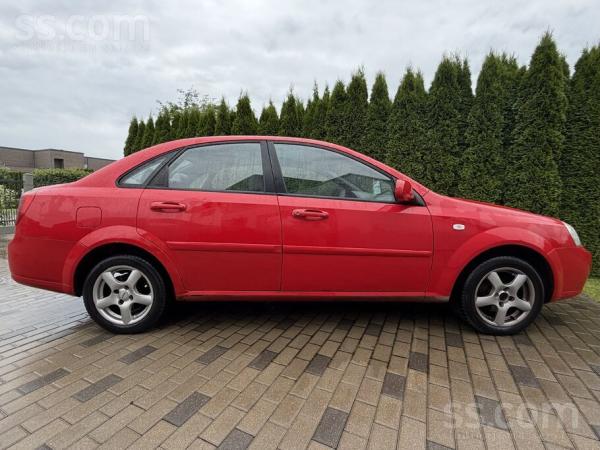 Red Chevrolet Lacetti 2008 in Riga, with an engine capacity of 1.60 L and mileage of 175 thousand km for 2490 €, photo 5 on AUTOMOTO.COM.LV
