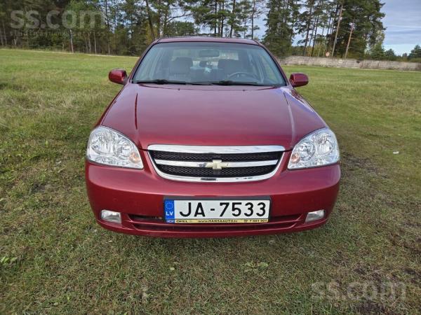 Red Chevrolet Lacetti 2008 in Riga, with an engine capacity of 1.80 L and mileage of 143 thousand km for 1350 €, photo 3 on AUTOMOTO.COM.LV