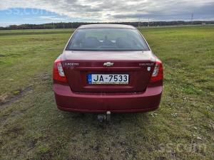 Red Chevrolet Lacetti 2008 in Riga, with an engine capacity of 1.80 L and mileage of 143 thousand km for 1350 €, photo 7 on AUTOMOTO.COM.LV