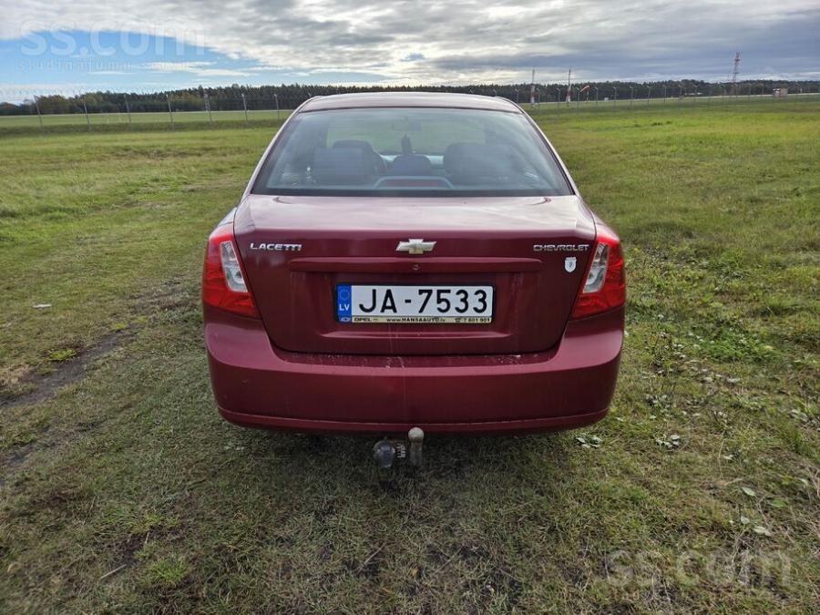 Red Chevrolet Lacetti 2008 in Riga, with an engine capacity of 1.80 L and mileage of 143 thousand km for 1350 €, photo 7 on AUTOMOTO.COM.LV