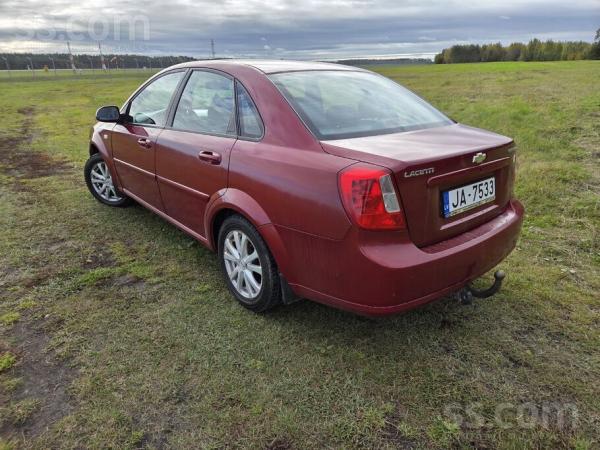 Red Chevrolet Lacetti 2008 in Riga, with an engine capacity of 1.80 L and mileage of 143 thousand km for 1350 €, photo 8 on AUTOMOTO.COM.LV