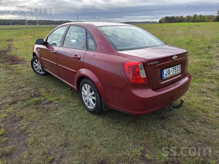 Red Chevrolet Lacetti 2008 in Riga, with an engine capacity of 1.80 L and mileage of 143 thousand km for 1350 €, photo 8 on AUTOMOTO.COM.LV
