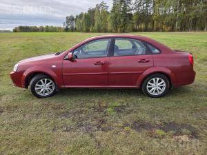 Red Chevrolet Lacetti 2008 in Riga, with an engine capacity of 1.80 L and mileage of 143 thousand km for 1350 €, photo 9 on AUTOMOTO.COM.LV
