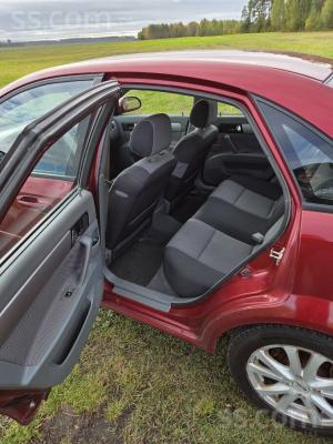 Red Chevrolet Lacetti 2008 in Riga, with an engine capacity of 1.80 L and mileage of 143 thousand km for 1350 €, photo 10 on AUTOMOTO.COM.LV