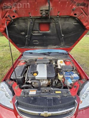 Red Chevrolet Lacetti 2008 in Riga, with an engine capacity of 1.80 L and mileage of 143 thousand km for 1350 €, photo 14 on AUTOMOTO.COM.LV