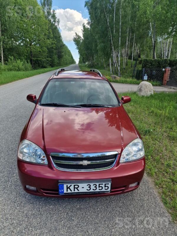 Sarkans Chevrolet Lacetti 2006 Jelgava, ar dzinēja tilpumu 1.60 L un nobraukumu 114 tūkst. km par 2250 €, foto 3 vietnē AUTOMOTO.COM.LV