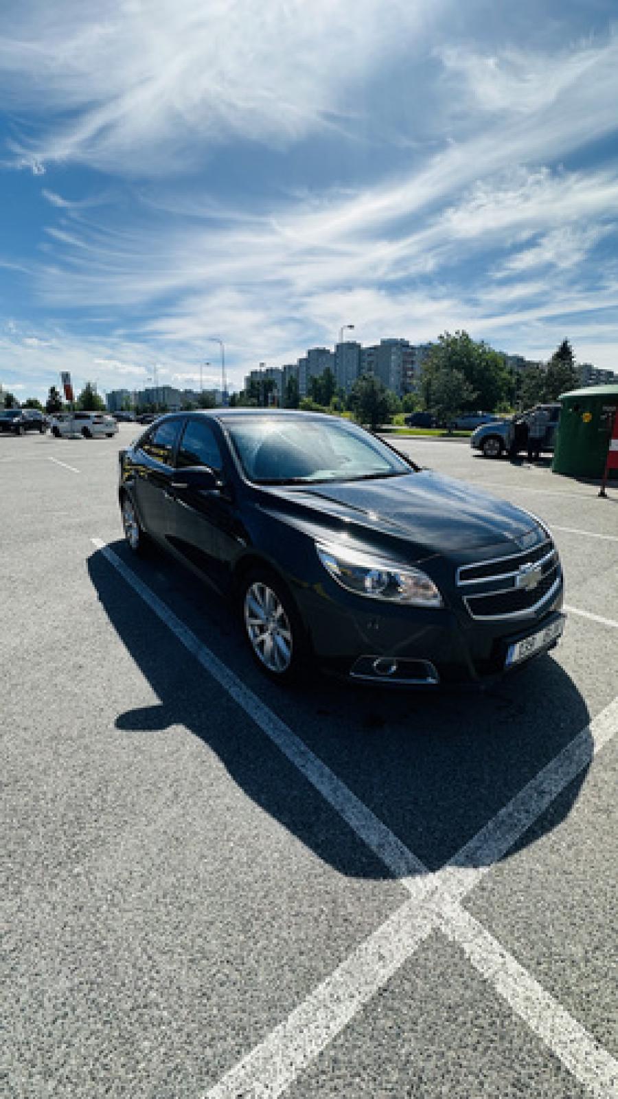 Black Chevrolet Malibu 2013 in Tallinn, with an engine capacity of 2.20 L and mileage of 125 thousand km for 6000 €, photo 6 on AUTOMOTO.COM.LV