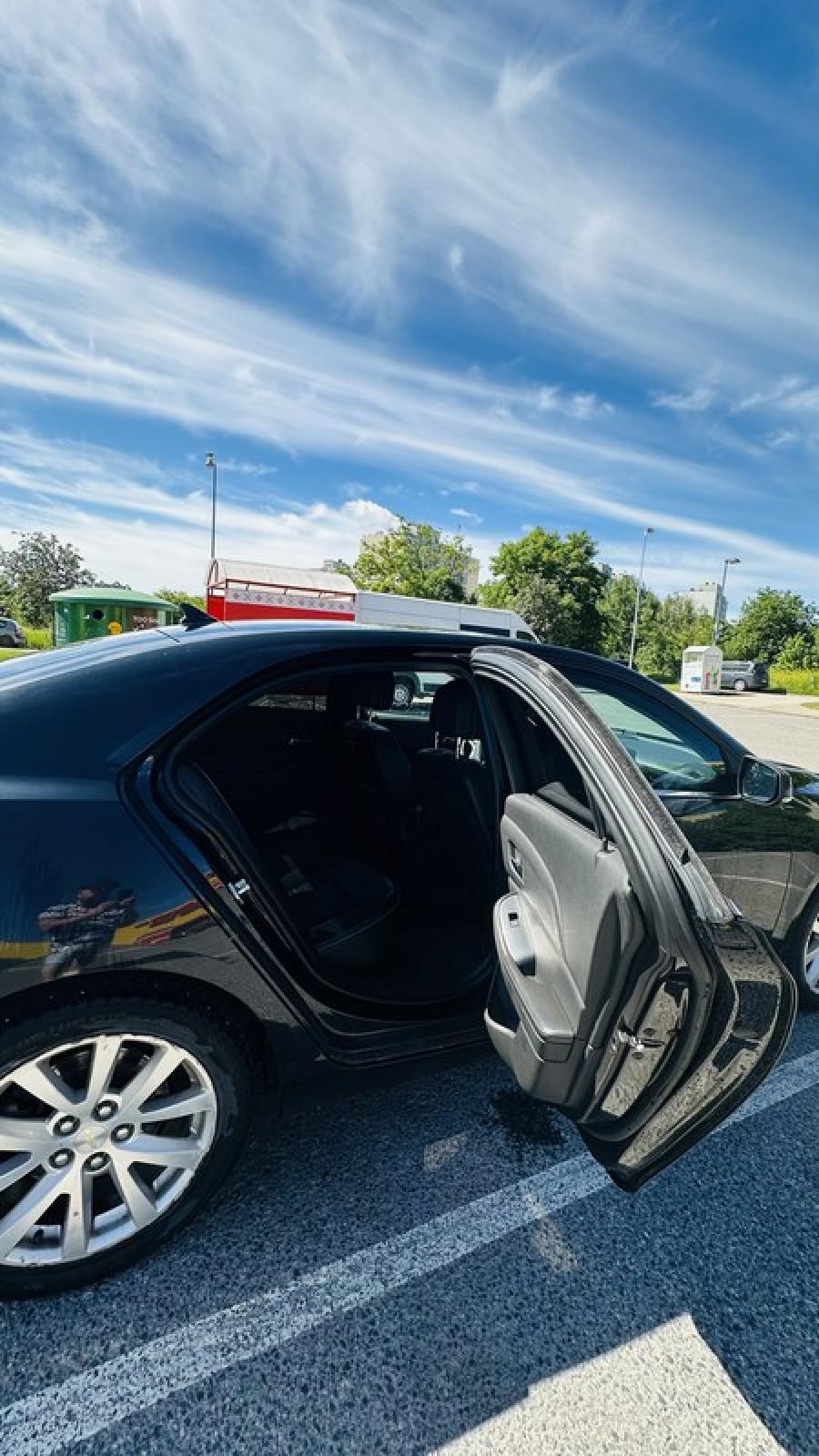Black Chevrolet Malibu 2013 in Tallinn, with an engine capacity of 2.20 L and mileage of 125 thousand km for 6000 €, photo 26 on AUTOMOTO.COM.LV