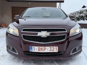 Red Chevrolet Malibu 2012 in Utena, with an engine capacity of 2.00 L and mileage of 200 thousand km for 3750 €, photo 3 on AUTOMOTO.COM.LV