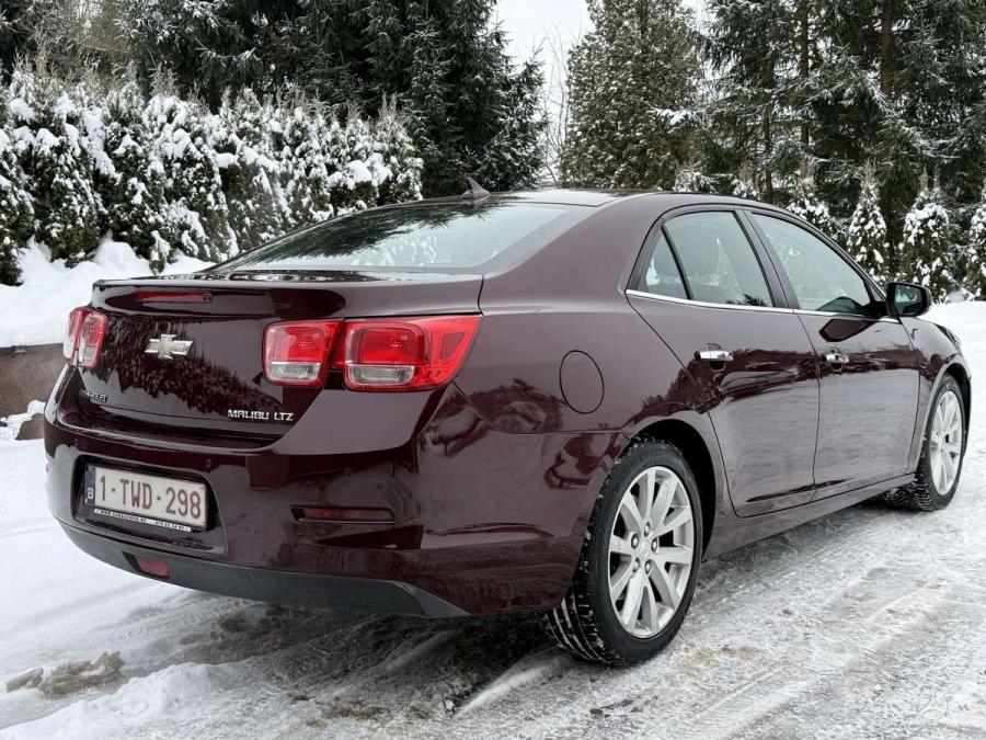 Red Chevrolet Malibu 2012 in Utena, with an engine capacity of 2.00 L and mileage of 200 thousand km for 3750 €, photo 6 on AUTOMOTO.COM.LV