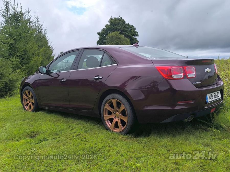 Red Chevrolet Malibu 2012 in Tallinn, with an engine capacity of 2.40 L and mileage of 140 thousand km for 11990 €, photo 5 on AUTOMOTO.COM.LV