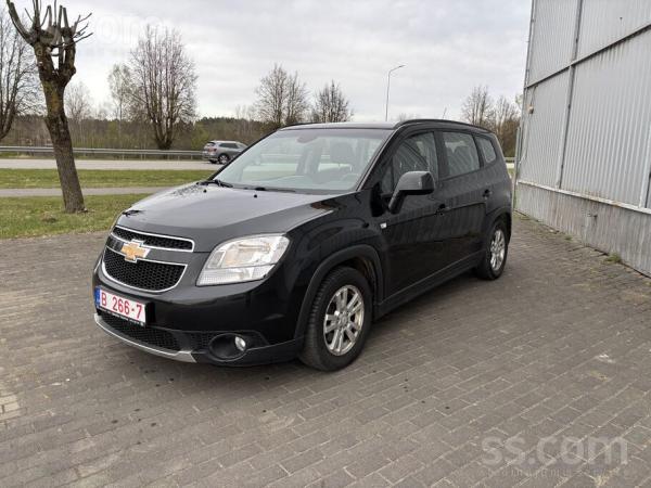 Black Chevrolet Orlando 2012 in Ogre, with an engine capacity of 2.00 L and mileage of 202 thousand km for 4290 €, photo 4 on AUTOMOTO.COM.LV