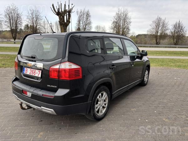 Black Chevrolet Orlando 2012 in Ogre, with an engine capacity of 2.00 L and mileage of 202 thousand km for 4290 €, photo 6 on AUTOMOTO.COM.LV