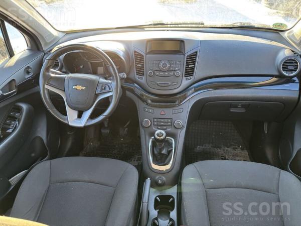 Black Chevrolet Orlando 2012 in Ogre, with an engine capacity of 2.00 L and mileage of 202 thousand km for 4290 €, photo 9 on AUTOMOTO.COM.LV