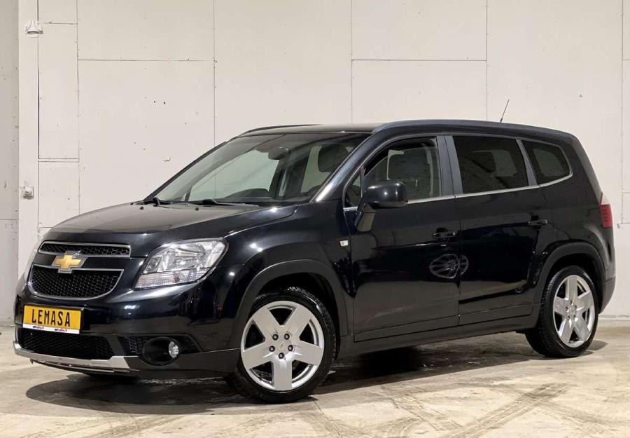 Black Chevrolet Orlando 2012 in Klaipeda, with an engine capacity of 2.00 L and mileage of 205 thousand km for 5999 €, photo 1 on AUTOMOTO.COM.LV