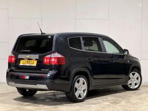 Black Chevrolet Orlando 2012 in Klaipeda, with an engine capacity of 2.00 L and mileage of 205 thousand km for 5999 €, photo 29 on AUTOMOTO.COM.LV