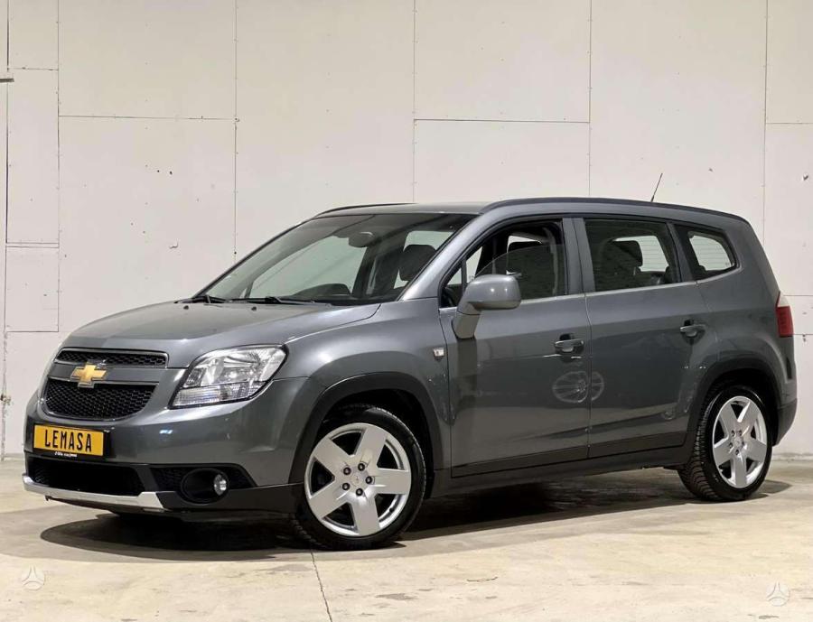 Black Chevrolet Orlando 2012 in Klaipeda, with an engine capacity of 2.00 L and mileage of 206 thousand km for 5999 €, photo 1 on AUTOMOTO.COM.LV