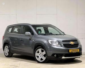 Black Chevrolet Orlando 2012 in Klaipeda, with an engine capacity of 2.00 L and mileage of 206 thousand km for 5999 €, photo 24 on AUTOMOTO.COM.LV