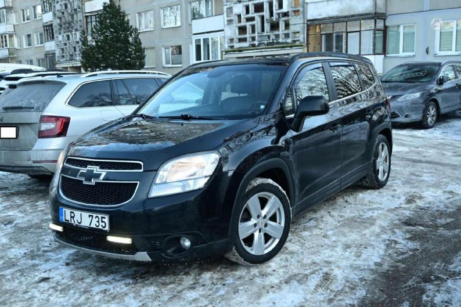 Black Chevrolet Orlando 2012 in Kaunas, with an engine capacity of 2.00 L and mileage of 266 thousand km for 4500 €, photo 1 on AUTOMOTO.COM.LV