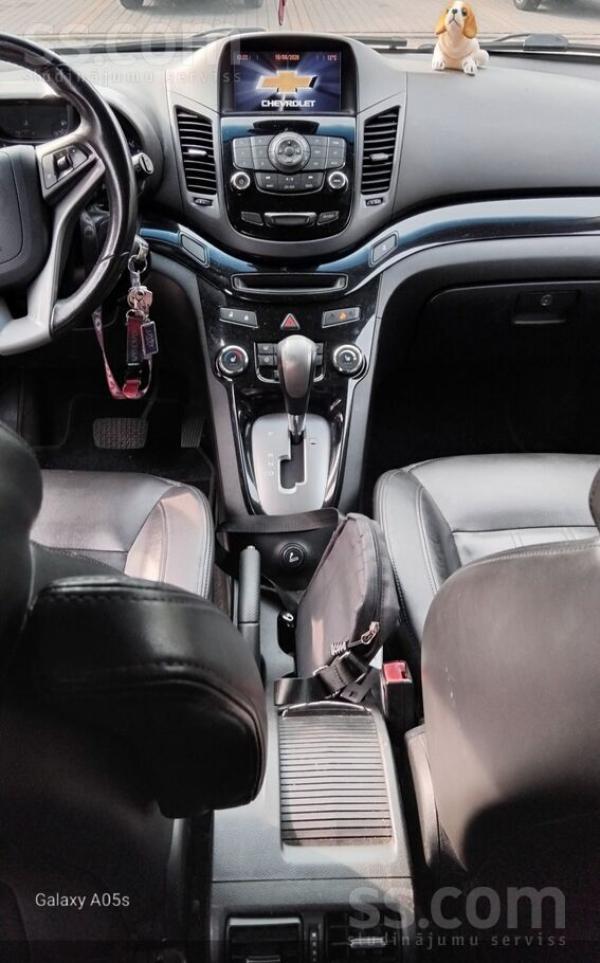 Black Chevrolet Orlando 2012 in Ventspils, with an engine capacity of 2.00 L and mileage of 221 thousand km for 4800 €, photo 3 on AUTOMOTO.COM.LV