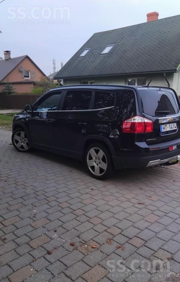 Black Chevrolet Orlando 2012 in Ventspils, with an engine capacity of 2.00 L and mileage of 221 thousand km for 4800 €, photo 6 on AUTOMOTO.COM.LV