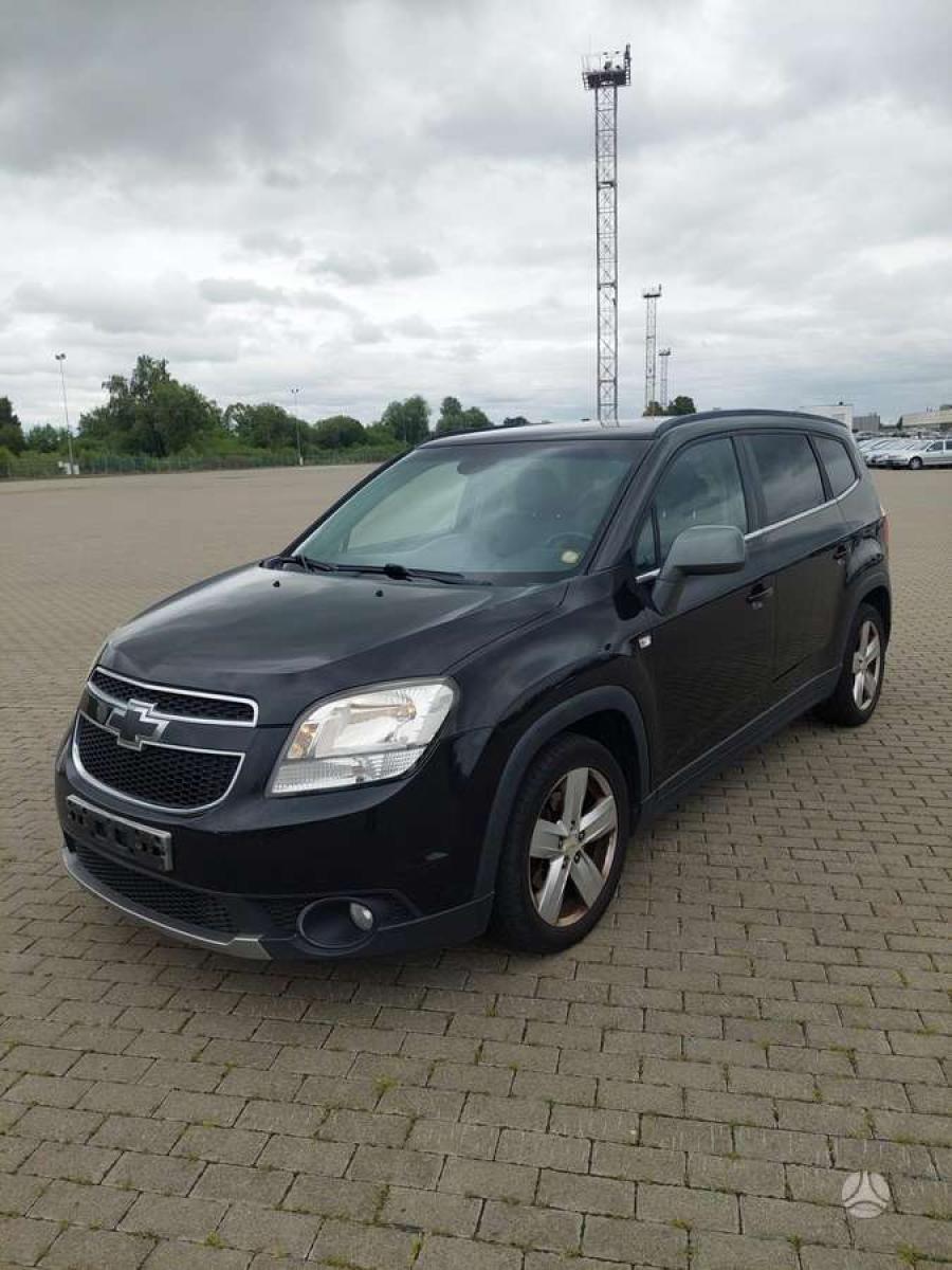 Black Chevrolet Orlando 2013 in Marijampole, with an engine capacity of 2.00 L and mileage of 220 thousand km for 3800 €, photo 1 on AUTOMOTO.COM.LV