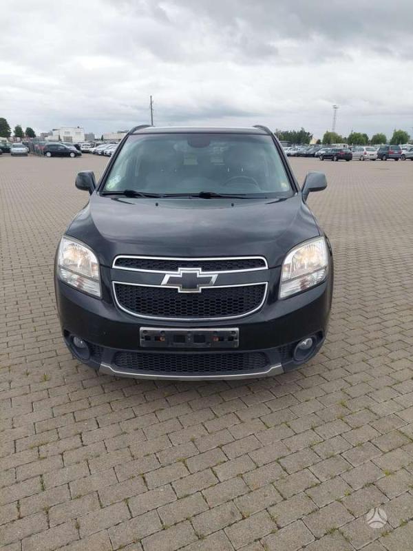 Black Chevrolet Orlando 2013 in Marijampole, with an engine capacity of 2.00 L and mileage of 220 thousand km for 3800 €, photo 2 on AUTOMOTO.COM.LV