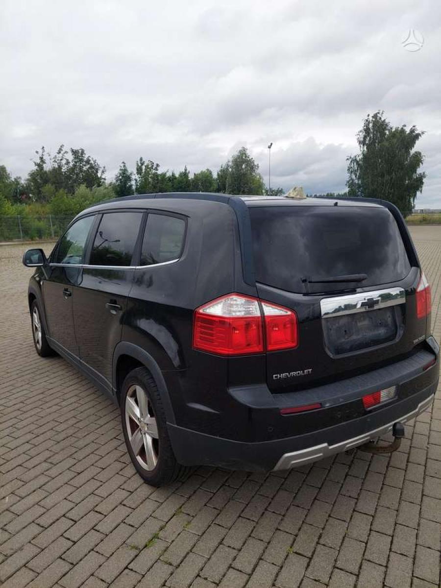 Black Chevrolet Orlando 2013 in Marijampole, with an engine capacity of 2.00 L and mileage of 220 thousand km for 3800 €, photo 8 on AUTOMOTO.COM.LV