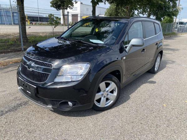 Black Chevrolet Orlando 2013 in Marijampole, with an engine capacity of 2.00 L and mileage of 226 thousand km for 3999 €, photo 1 on AUTOMOTO.COM.LV