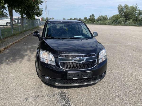 Black Chevrolet Orlando 2013 in Marijampole, with an engine capacity of 2.00 L and mileage of 226 thousand km for 3999 €, photo 7 on AUTOMOTO.COM.LV