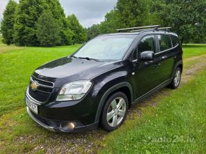 Black Chevrolet Orlando 2011 in Parnu, with an engine capacity of 2.00 L and mileage of 328 thousand km for 4790 €, photo 3 on AUTOMOTO.COM.LV