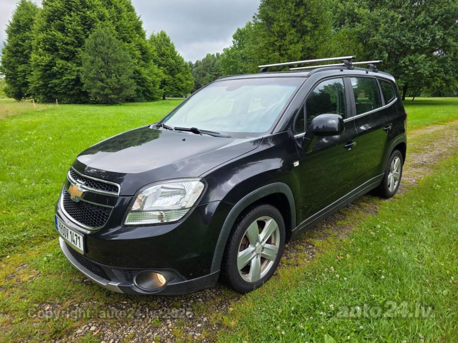 Black Chevrolet Orlando 2011 in Parnu, with an engine capacity of 2.00 L and mileage of 328 thousand km for 4790 €, photo 3 on AUTOMOTO.COM.LV