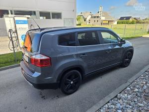 Grey Chevrolet Orlando 2011 in Kluonaliai, with an engine capacity of 2.00 L and mileage of 210 thousand km for 5199 €, photo 13 on AUTOMOTO.COM.LV