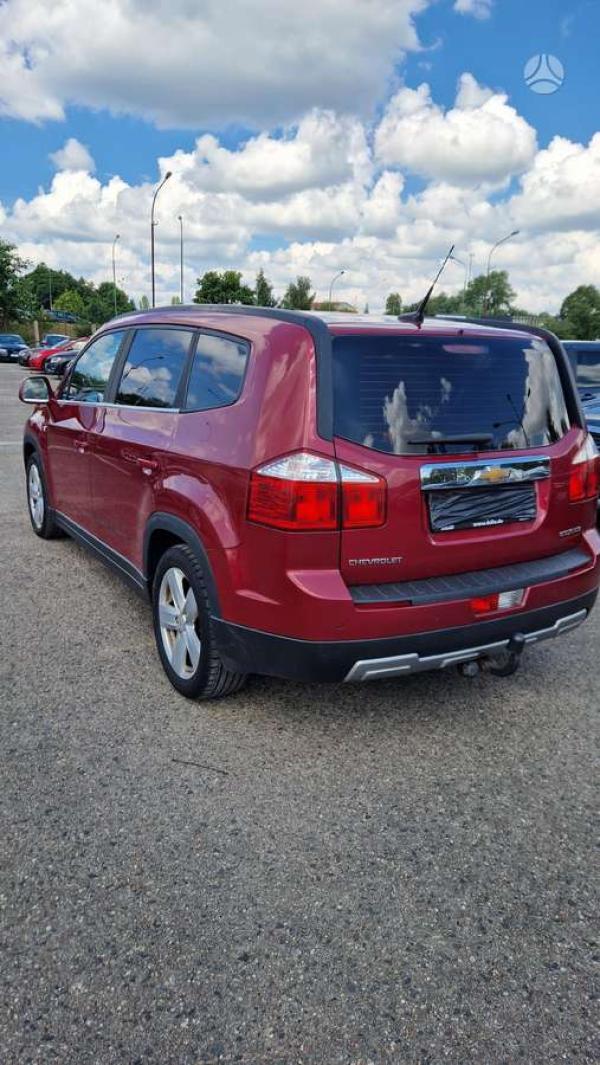 Red Chevrolet Orlando 2011 in Klaipeda, with an engine capacity of 2.00 L and mileage of 185 thousand km for 4200 €, photo 4 on AUTOMOTO.COM.LV