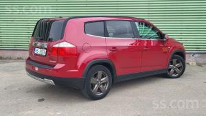 Red Chevrolet Orlando 2011 in Riga, with an engine capacity of 2.00 L and mileage of 250 thousand km for 3990 €, photo 6 on AUTOMOTO.COM.LV