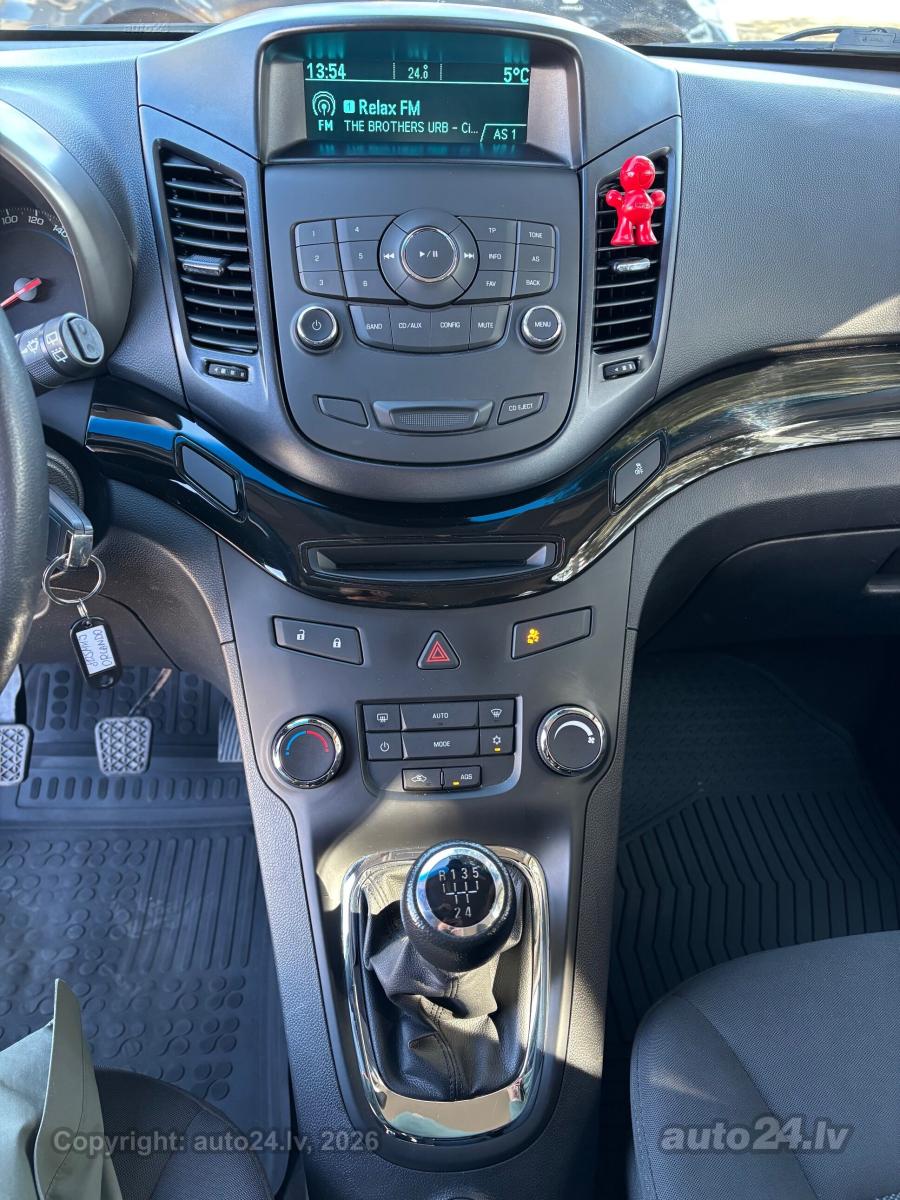 Red Chevrolet Orlando 2012 in Tallinn, with an engine capacity of 1.80 L and mileage of 132 thousand km for 5990 €, photo 15 on AUTOMOTO.COM.LV