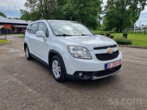 White Chevrolet Orlando 2012 in Ogre, with an engine capacity of 2.00 L and mileage of 0 thousand km for 5570 €, photo 3 on AUTOMOTO.COM.LV