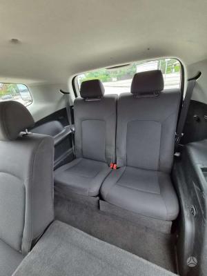 White Chevrolet Orlando 2012 in Druskininkai, with an engine capacity of 2.00 L and mileage of 278 thousand km for 4200 €, photo 11 on AUTOMOTO.COM.LV