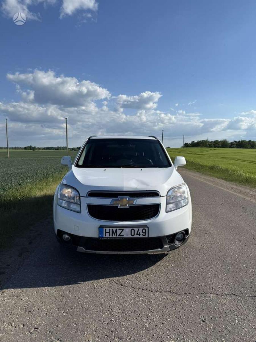 White Chevrolet Orlando 2012 in Radviliskis, with an engine capacity of 2.00 L and mileage of 219 thousand km for 4400 €, photo 8 on AUTOMOTO.COM.LV
