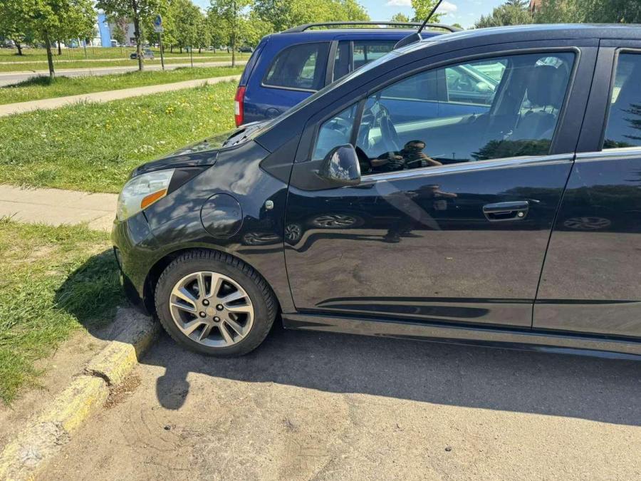 Black Chevrolet Spark 2015 in Kaunas, with an engine capacity of 0.00 L and mileage of 22 thousand km for 6700 €, photo 7 on AUTOMOTO.COM.LV